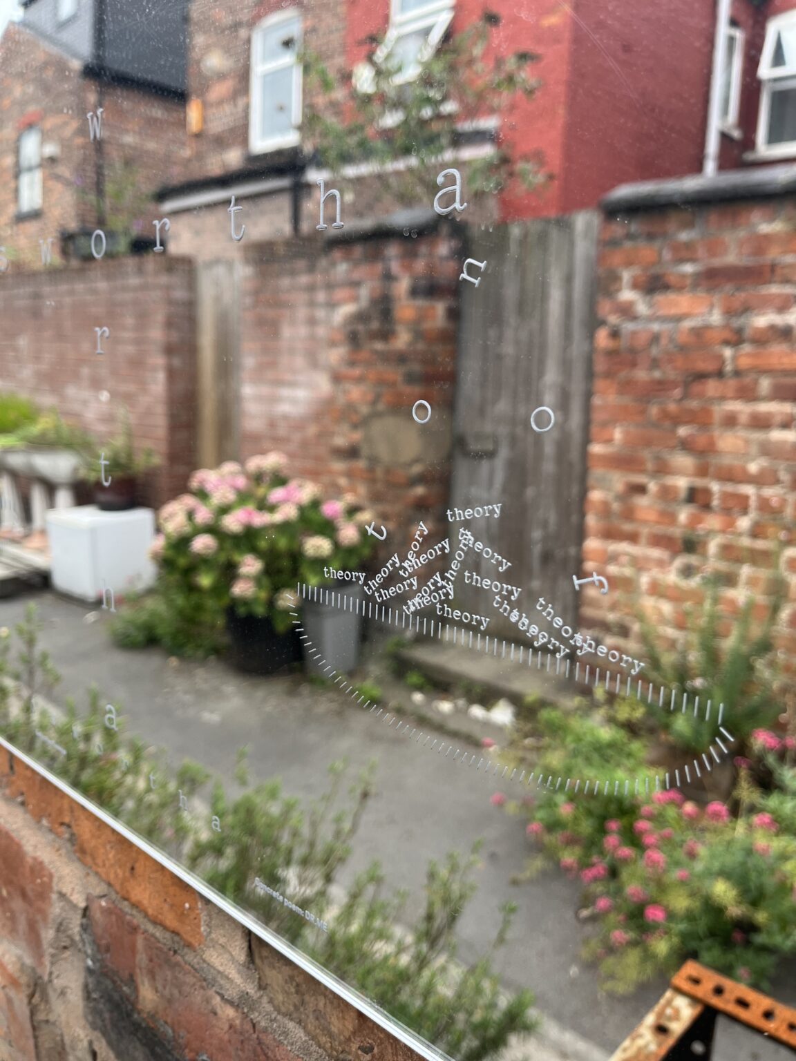 Neglected Moss Side ginnel transformed into leafy art gallery