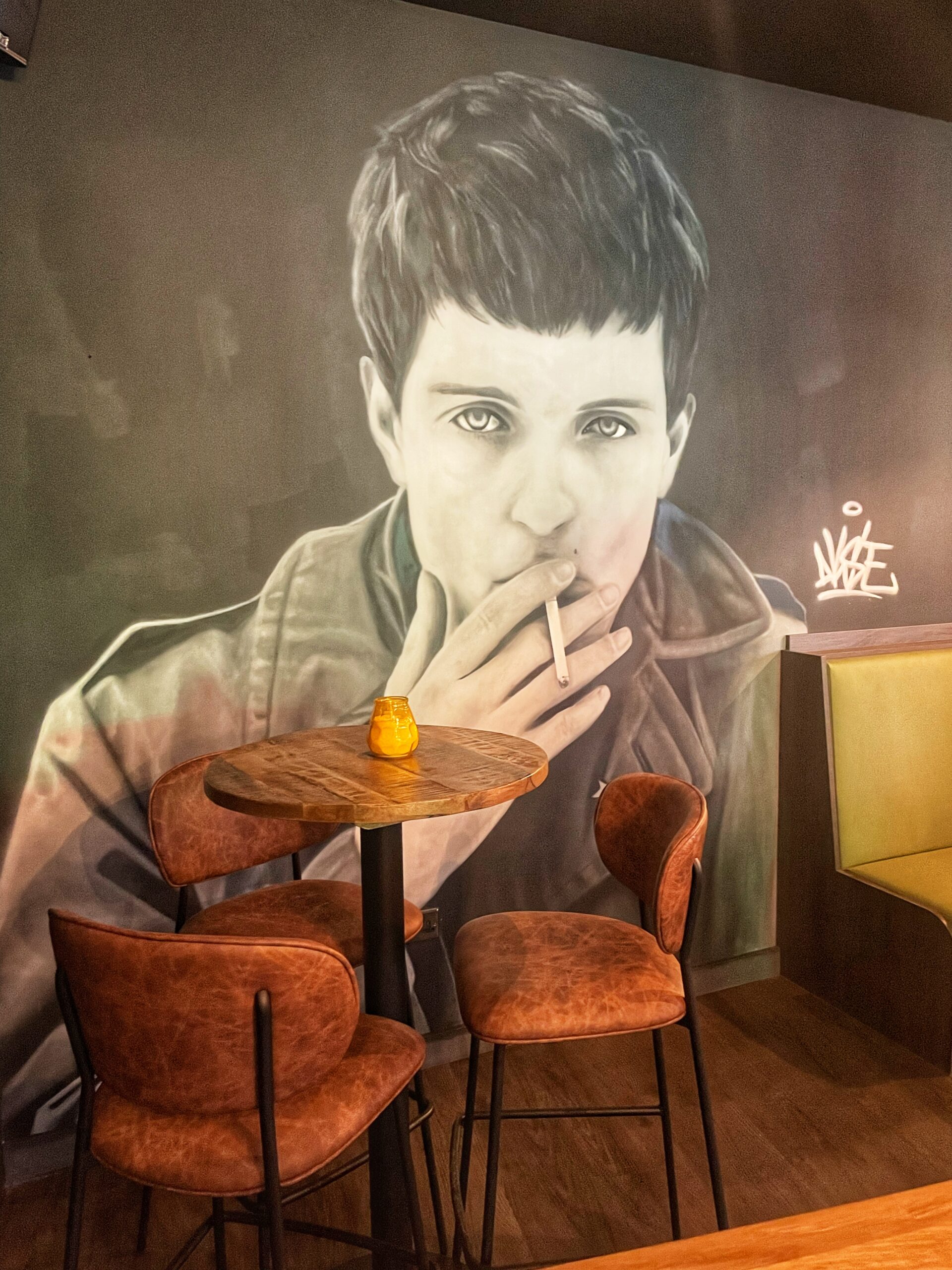 A new Joy Division-inspired bar has opened in Manchester