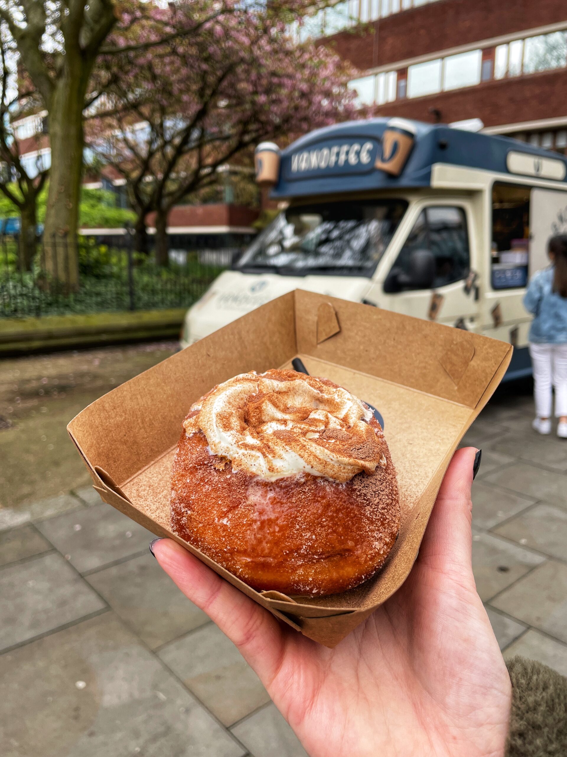 There's a van on Oxford Road selling coffee-filled donuts