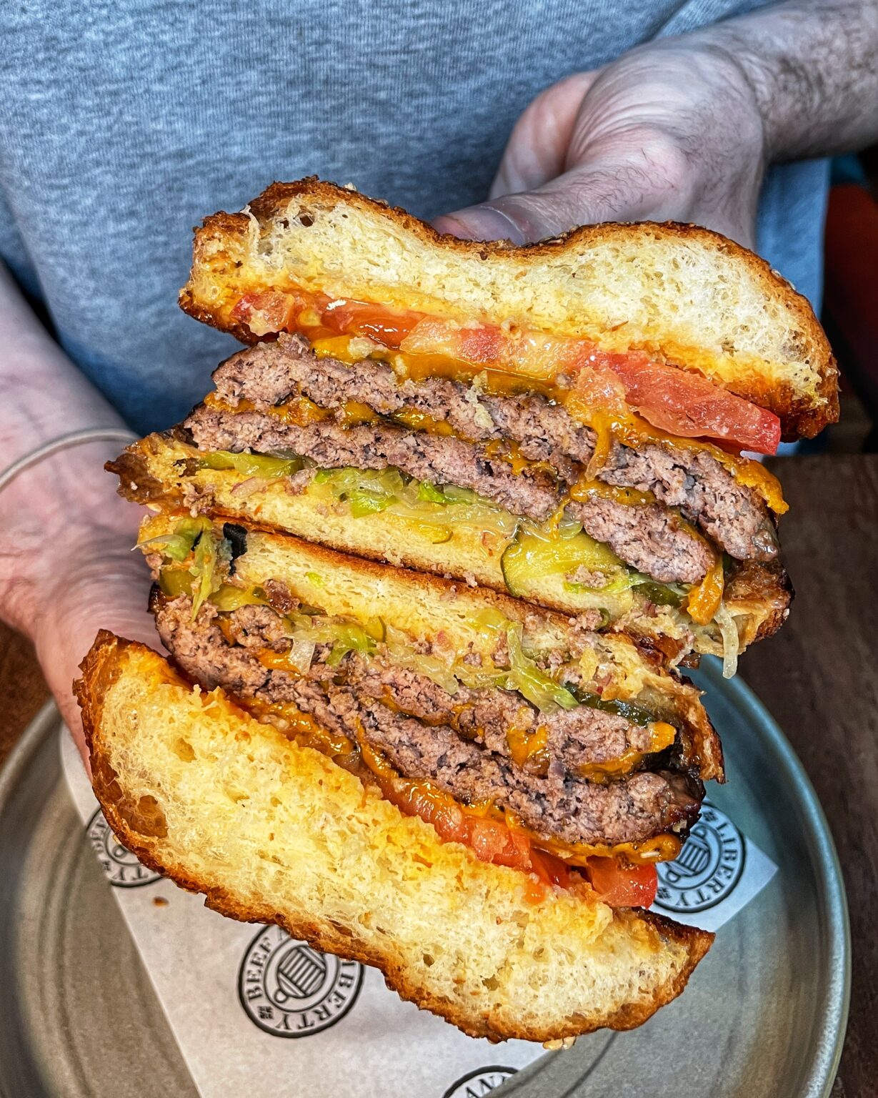 Hawksmoor team up with Burgerism and Pollen Bakery for new smash burger ...