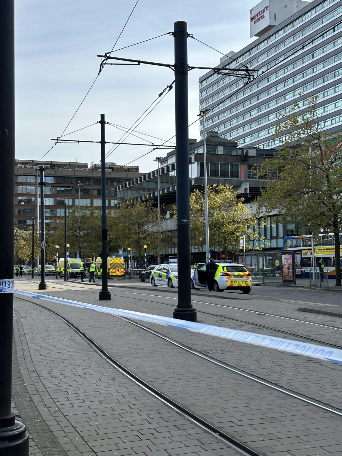 Manchester bus crashes into row of shops in City Tower building at ...
