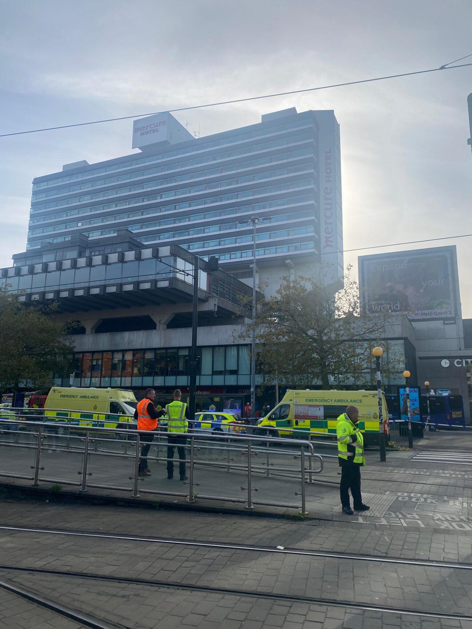 Manchester bus crashes into row of shops in City Tower building at ...