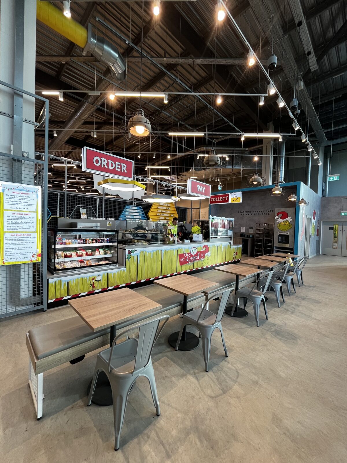 A Grinch-themed cafe has opened in a Greater Manchester Primark