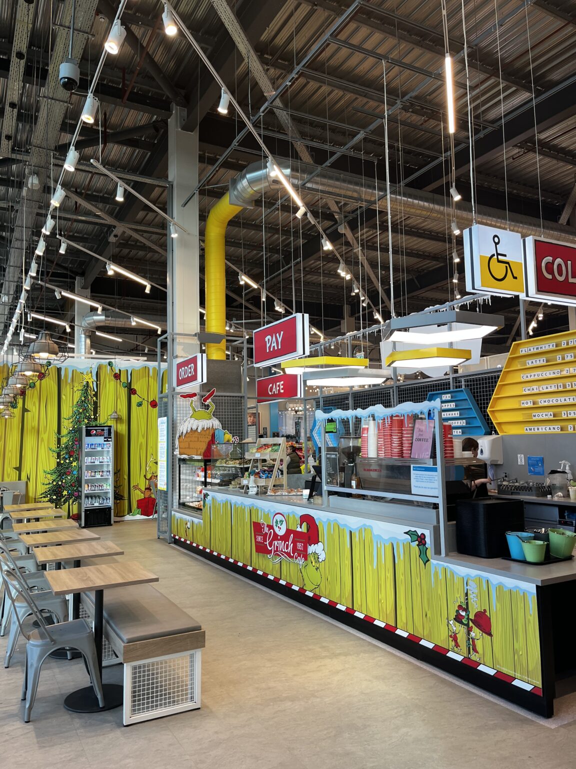 A Grinch-themed cafe has opened in a Greater Manchester Primark